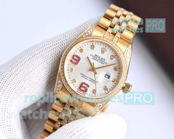Swiss Replica Rolex Datejust Gold Ladies Watch Ruby and Diamond Dial 31mm