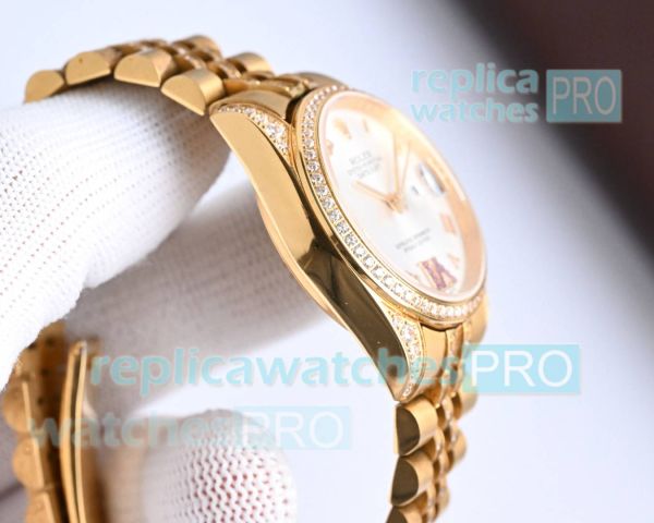 Swiss Replica Rolex Datejust Gold Ladies Watch Ruby and Diamond Dial 31mm